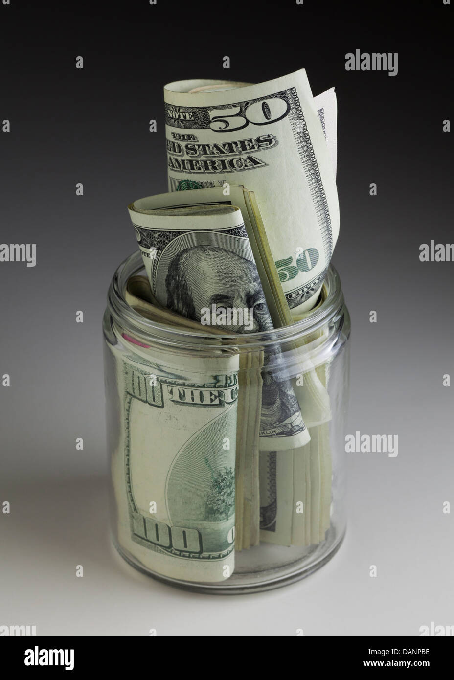 Money in glass hi-res stock photography and images - Alamy