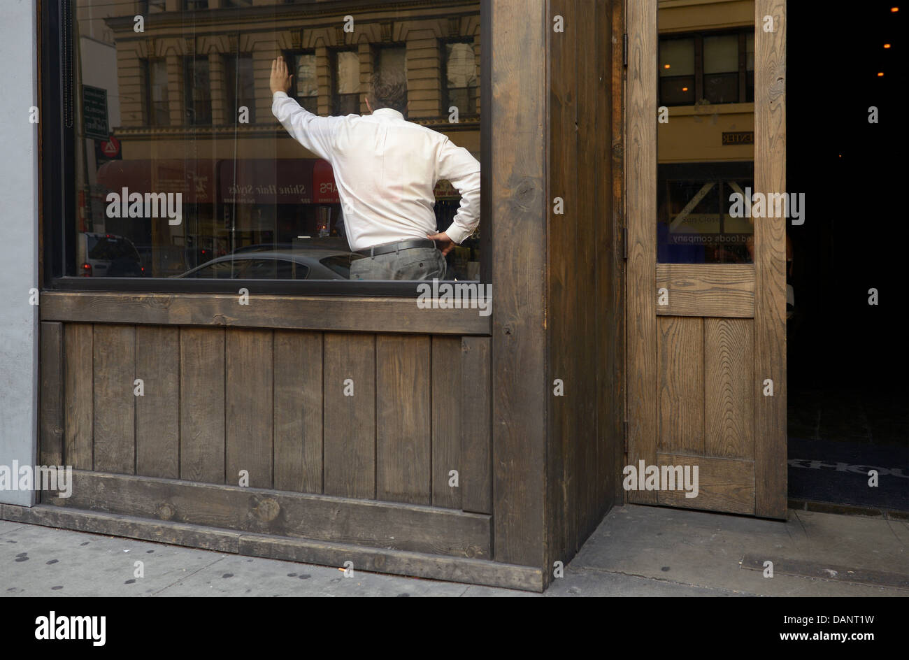 Man leans hi-res stock photography and images - Alamy