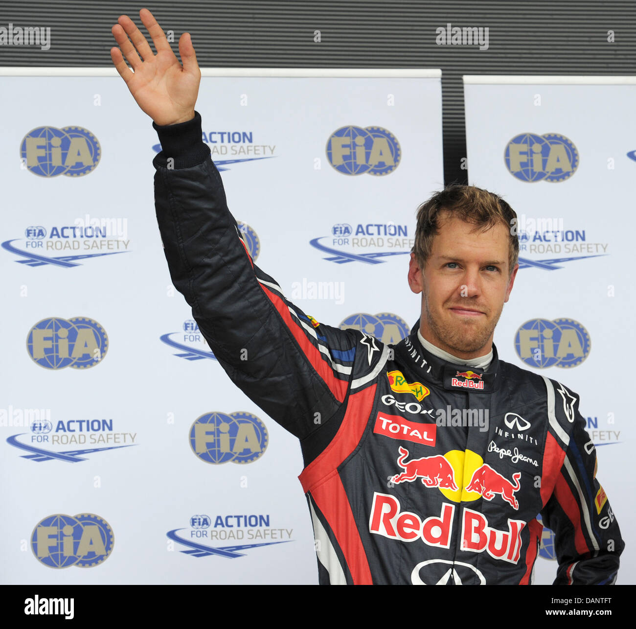 German Formula One driver Sebastian Vettel of Red Bull celebrates after ...
