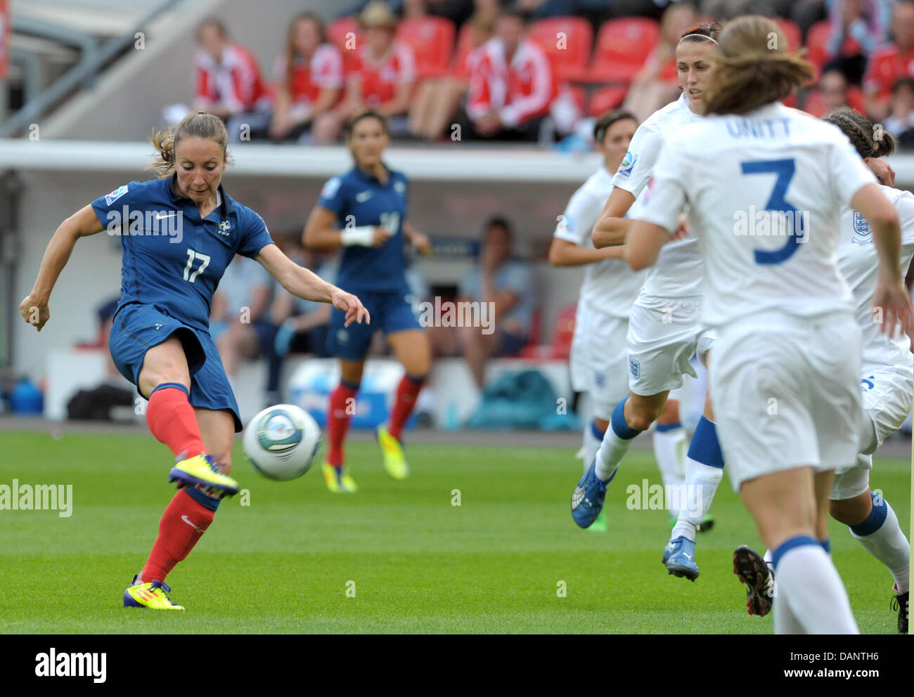 Gaetane Thiney (L) of France try to score during the quarter-final ...