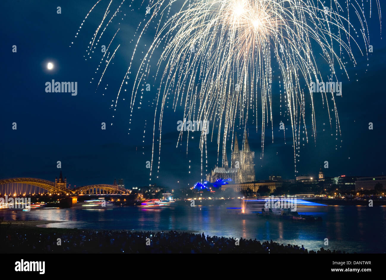 People watch fireworks with music over the Rhine in Cologne, Germany, 9 ...