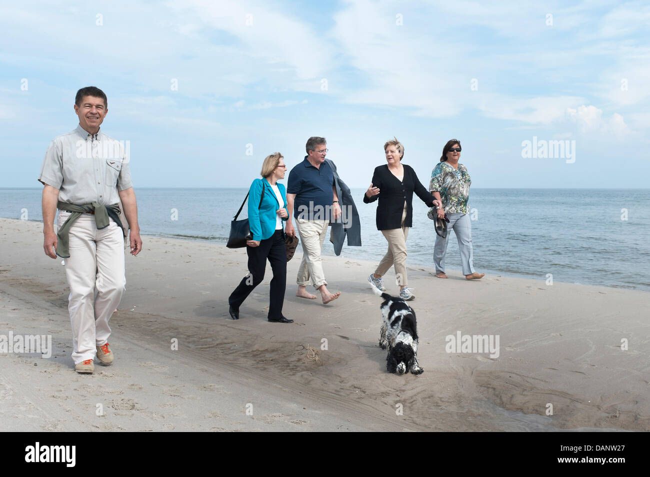 German chancellor Angela Merkel (2-r), her husband Joachim Sauer and ...