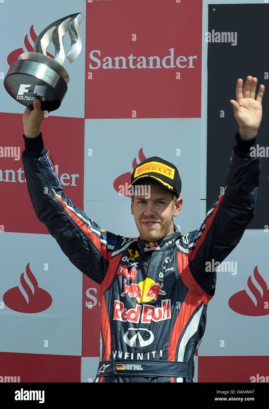 German Formula One driver Sebastian Vettel of Red Bull celebrates on ...