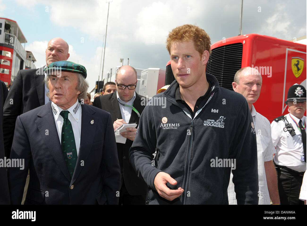 Britain's Prince Harry (R) and former British Formula One driver Sir ...