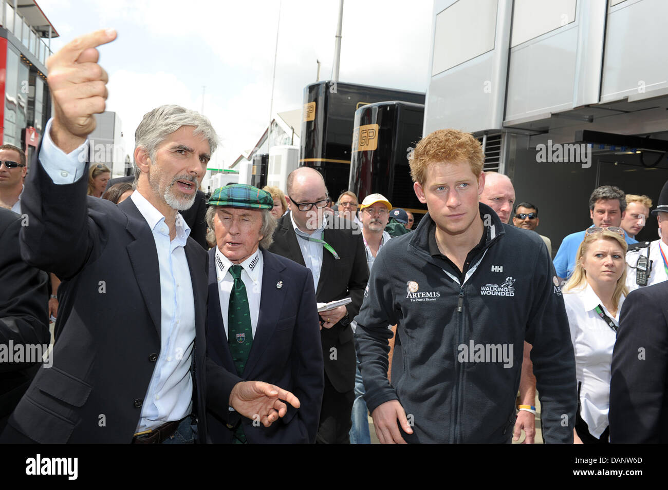 Britain's Prince Harry (R) and former British Formula One drivers Damon ...