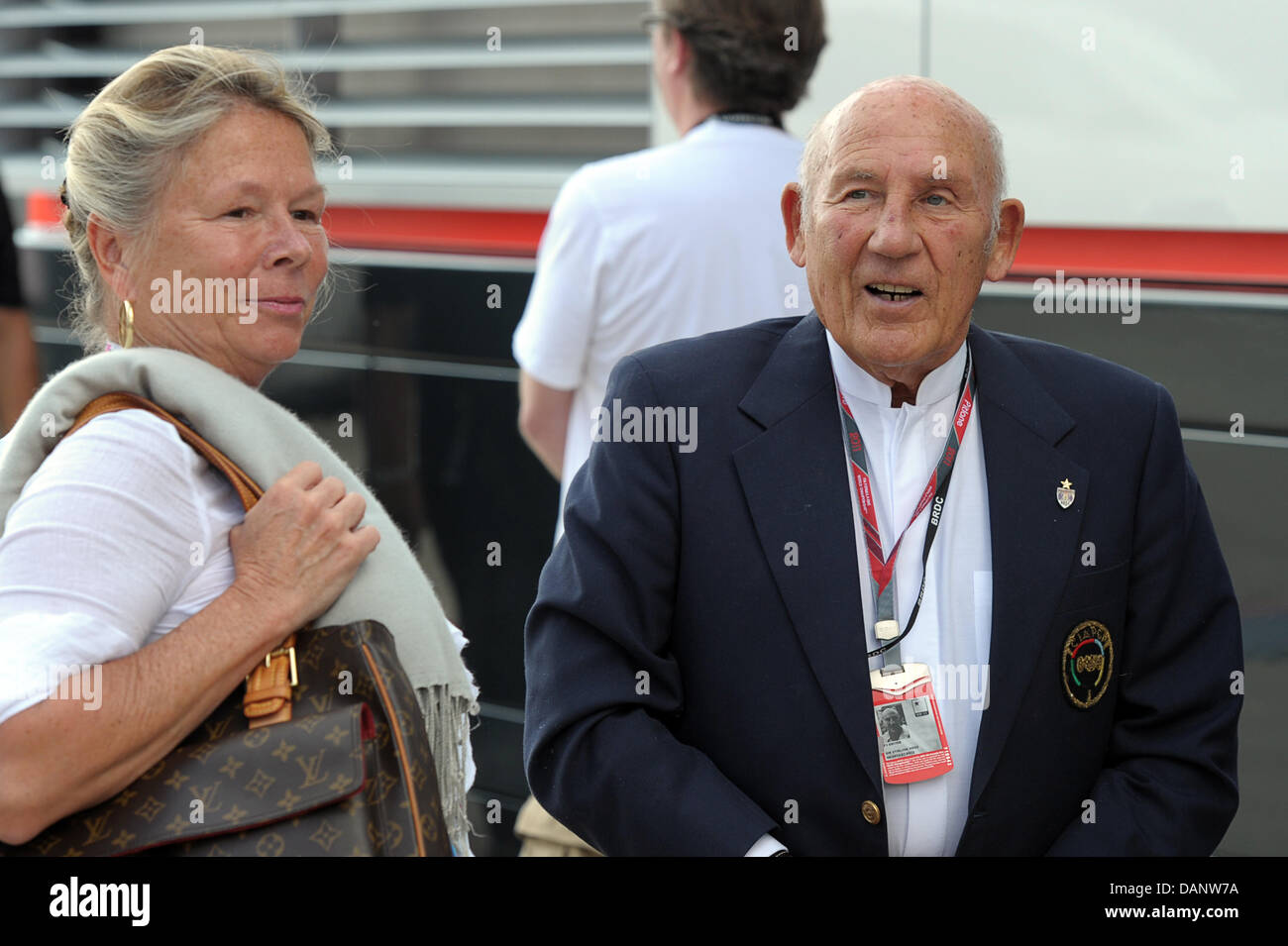 Former British Formula One driver Sir Stirling Moss (R) and his wife ...