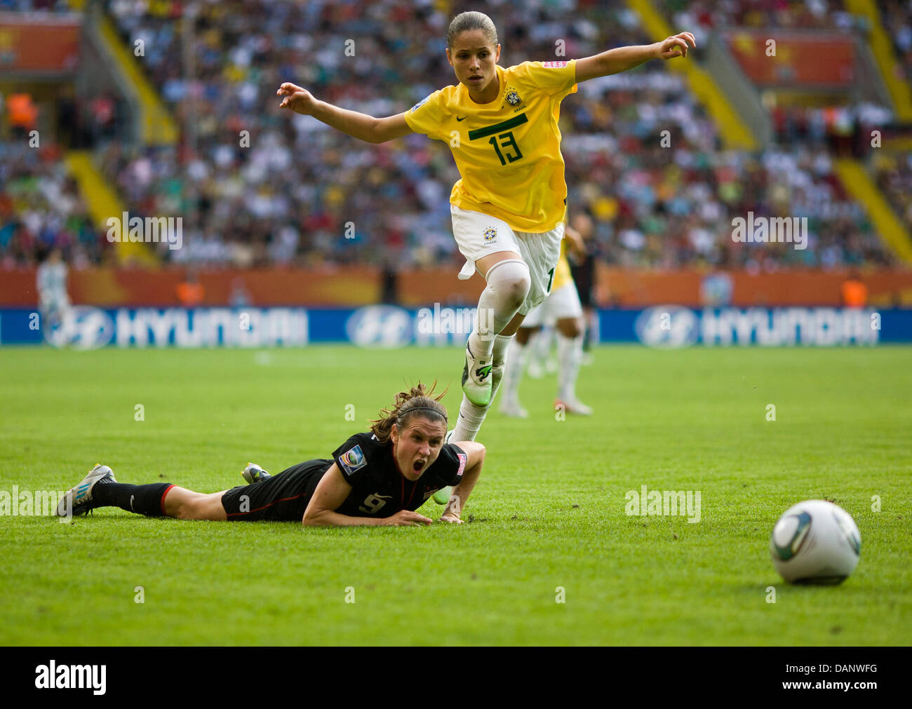 USA s Heather O Reilly (L) and Brazil`s Erika (R) during the quater ...