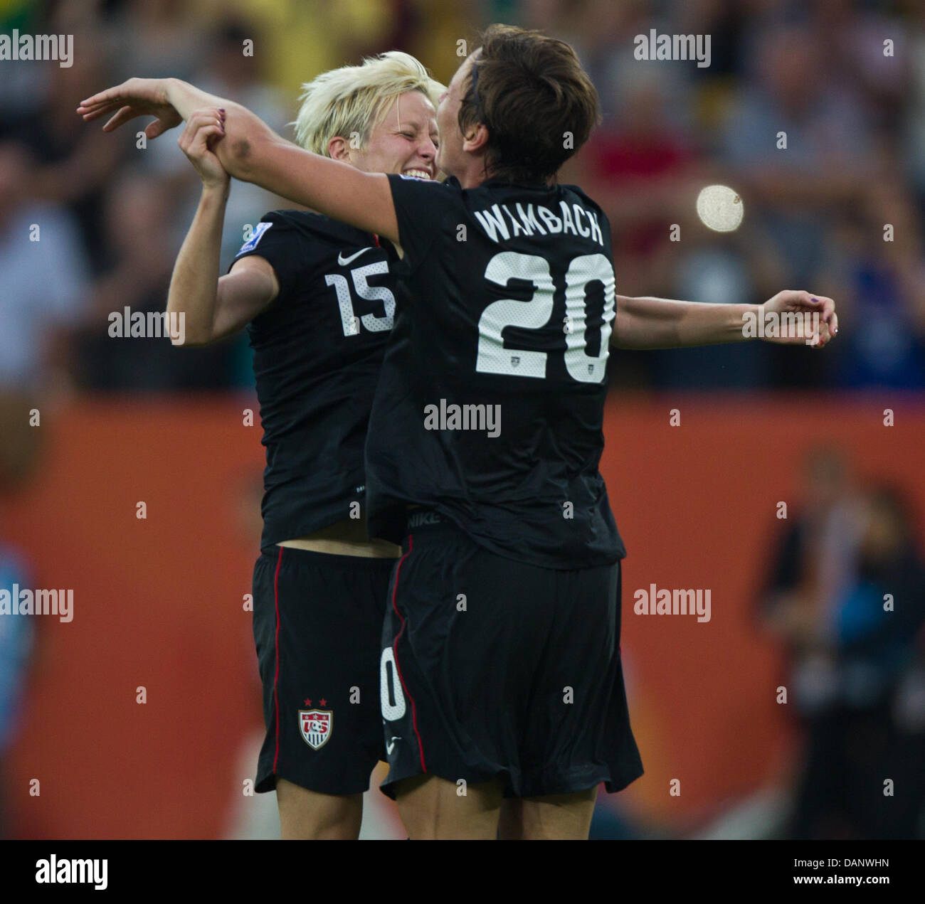 USA's Megan Rapinoe (l) and Abby Wambach celebrate during the quarter ...