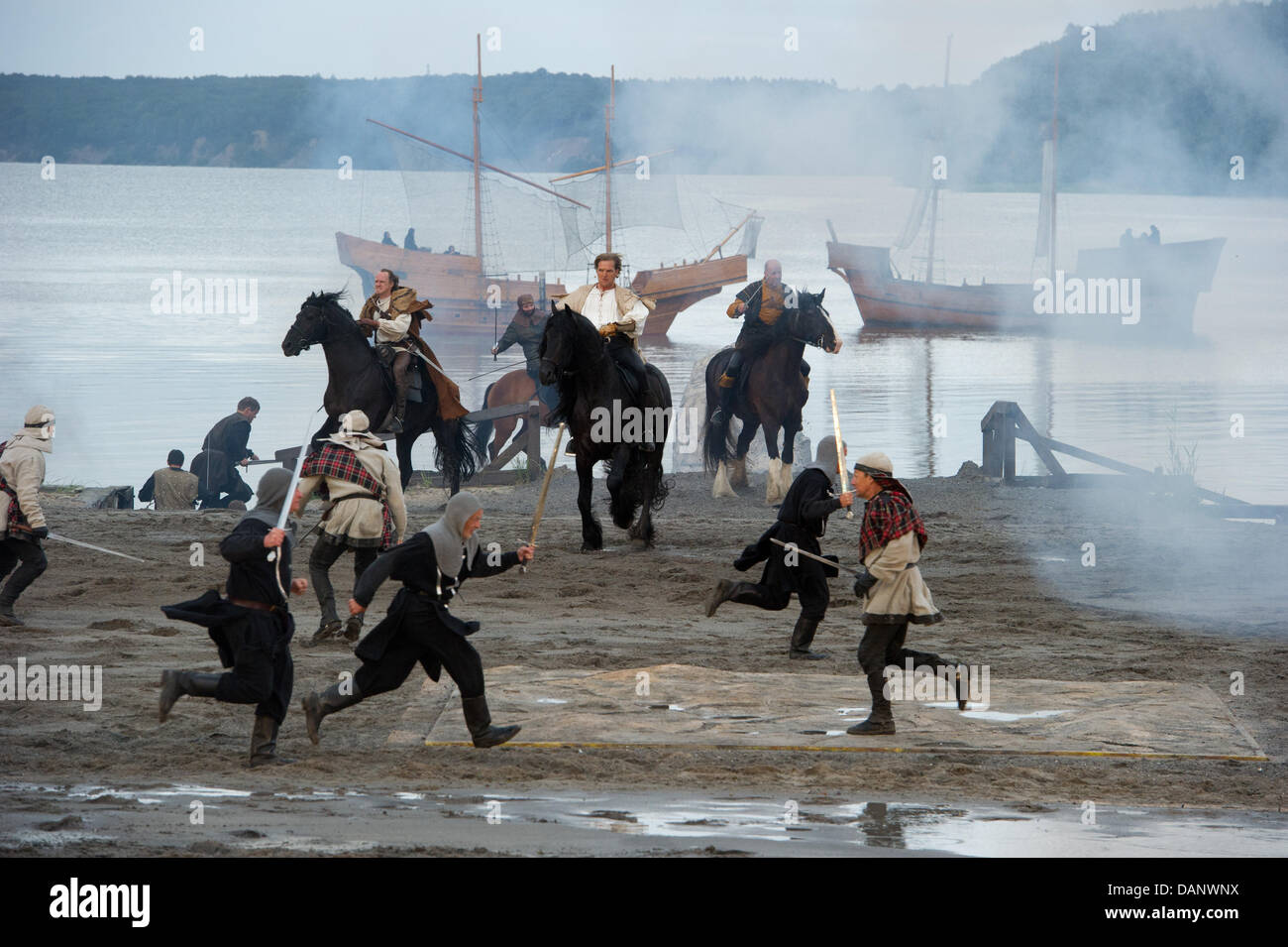 Actor Sascha Gluth (M) as pirate Klaus Stoertebeker fights against his ...