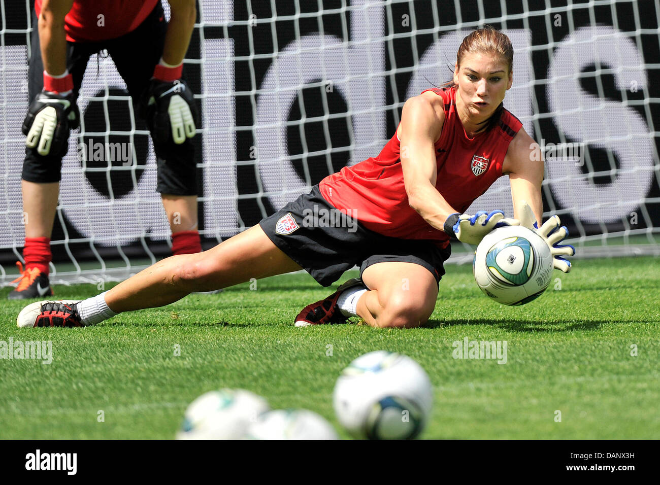 Goalkeeper Hope Solo of team USA saves a ball during a training session ...