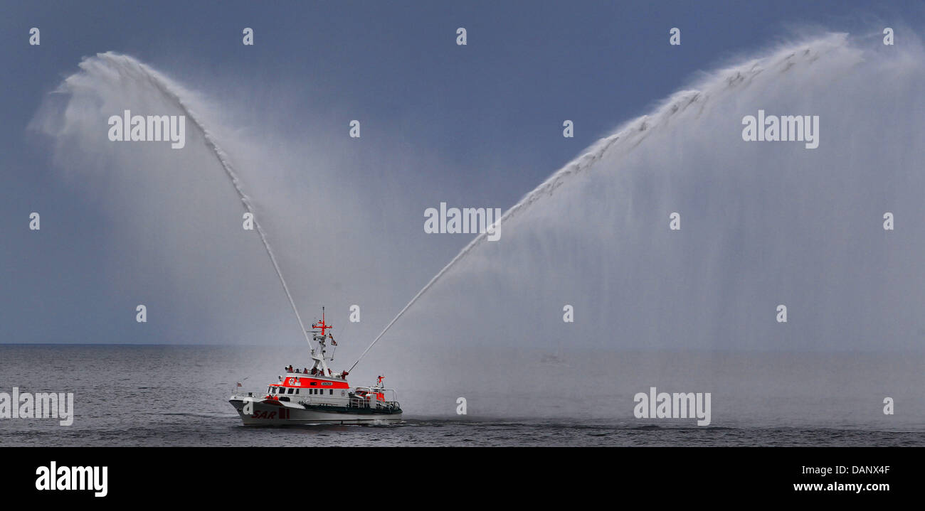 Rescuecruiser 'Arkona' uses its water canons to welcome the latest ...