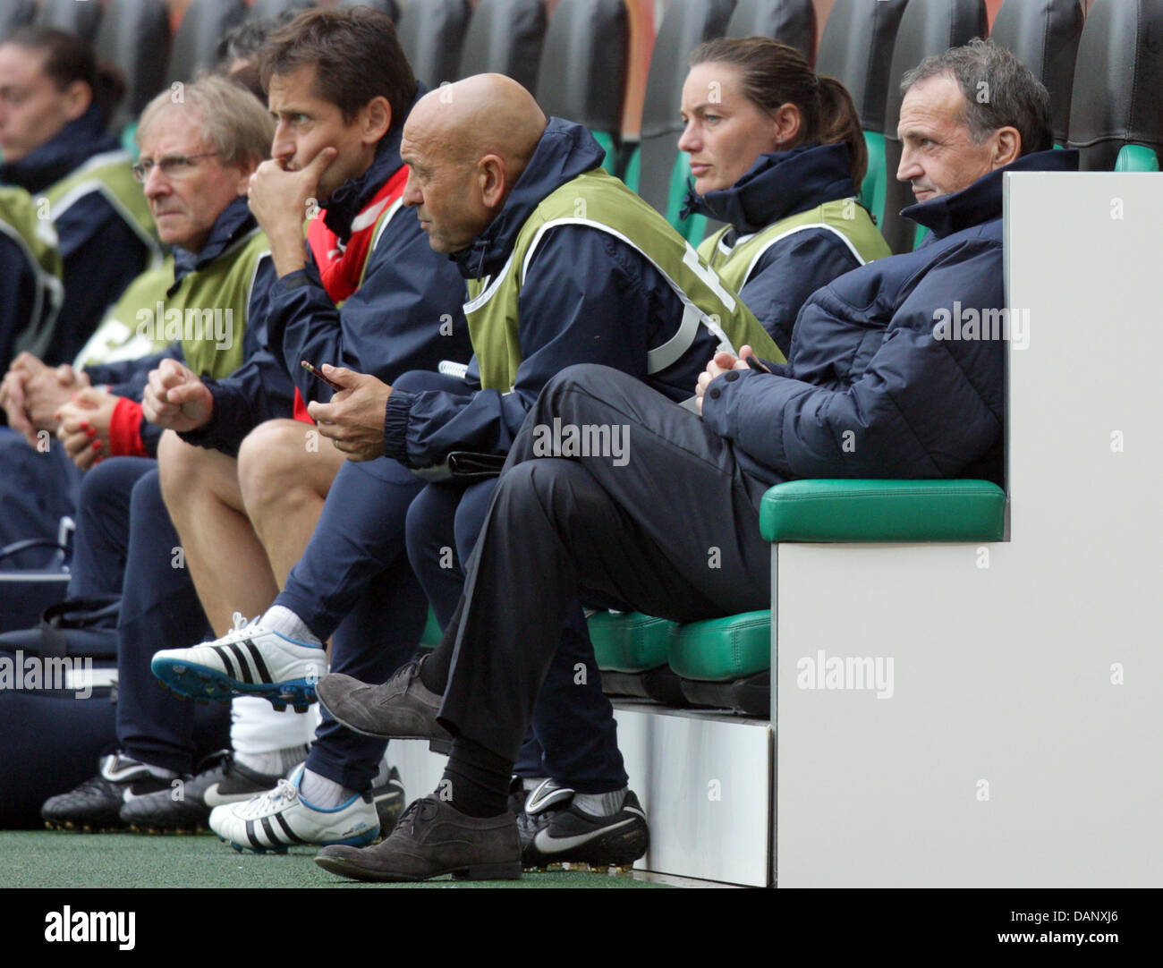 France's head coach Bruno Bini (R) during the semi-final soccer match ...