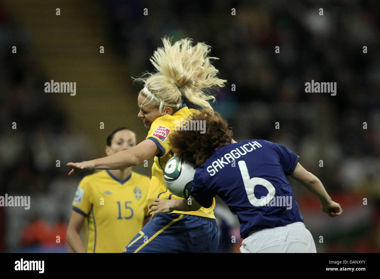 Japan's Mizuho Sakaguchi (r) and Sweden's Lisa Dahlkvist vie for the ...