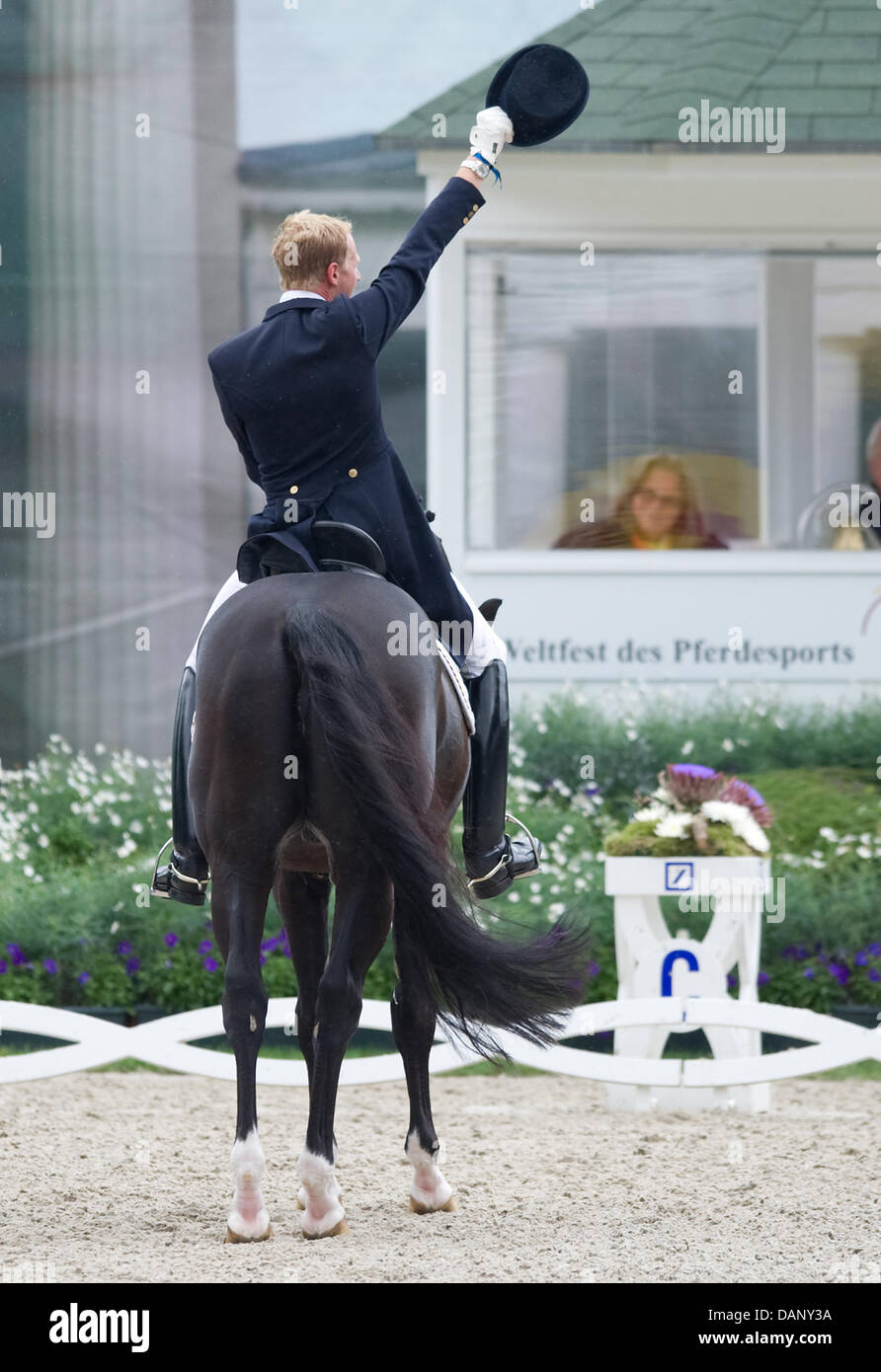 Matthias Alexander Rath riding Totilas celebrates in front of the ...