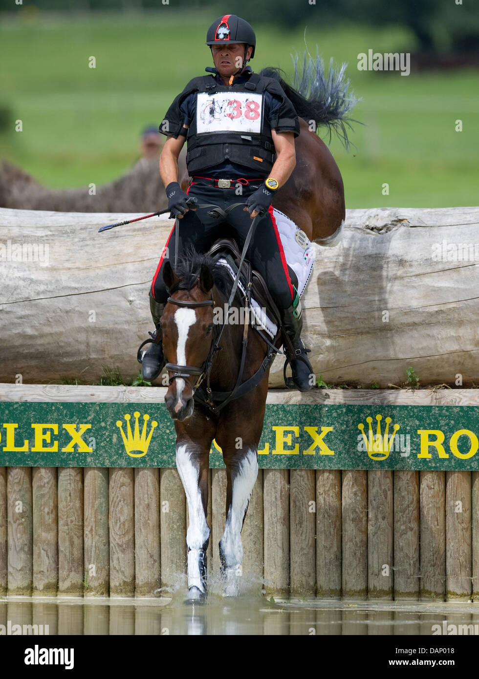 Italian eventing equestrian Stefano Brecciaroli jumps over a natural ...