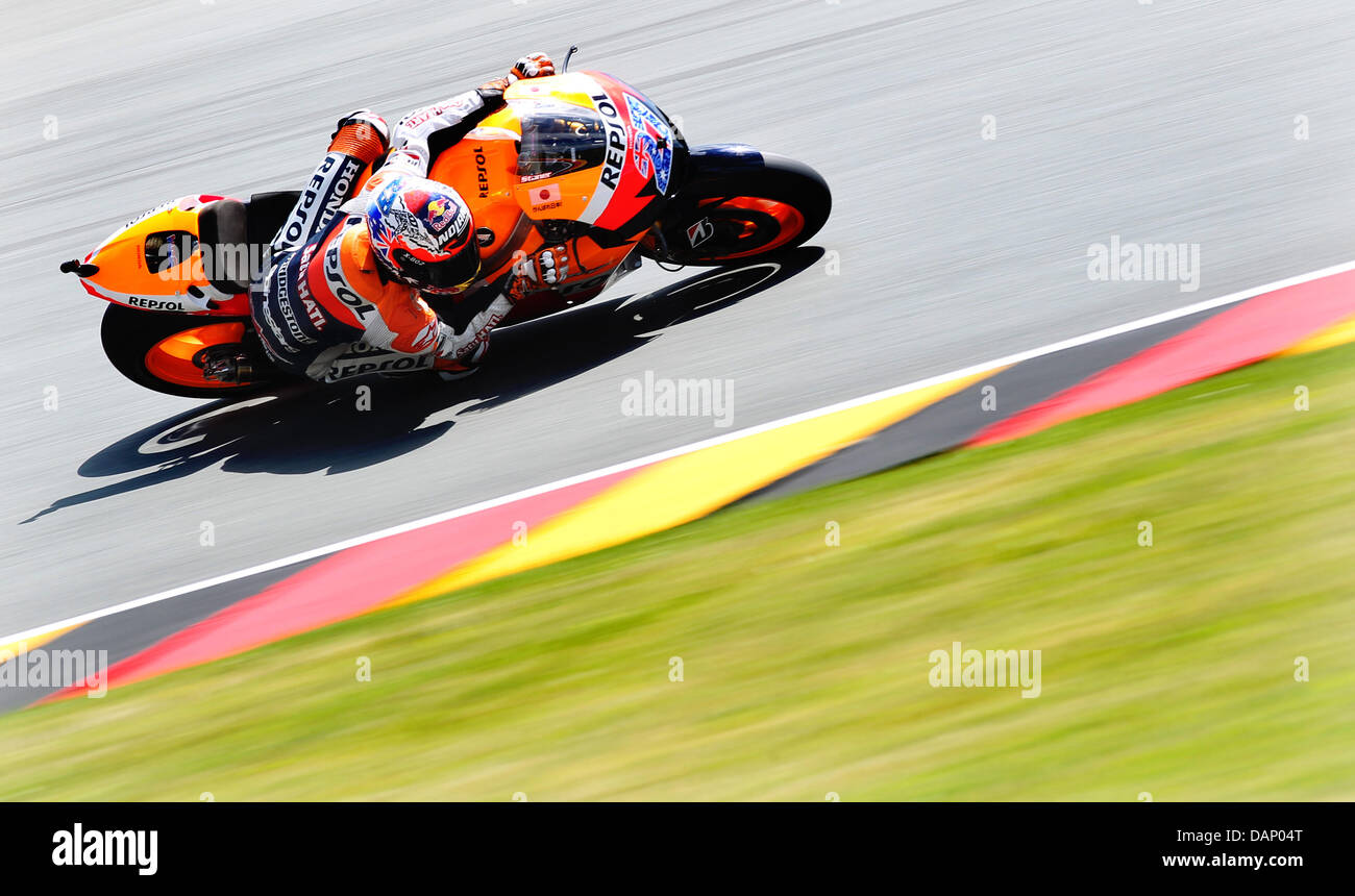 The Australian Honda driver Casey Stoner drives his motorcycle in the ...