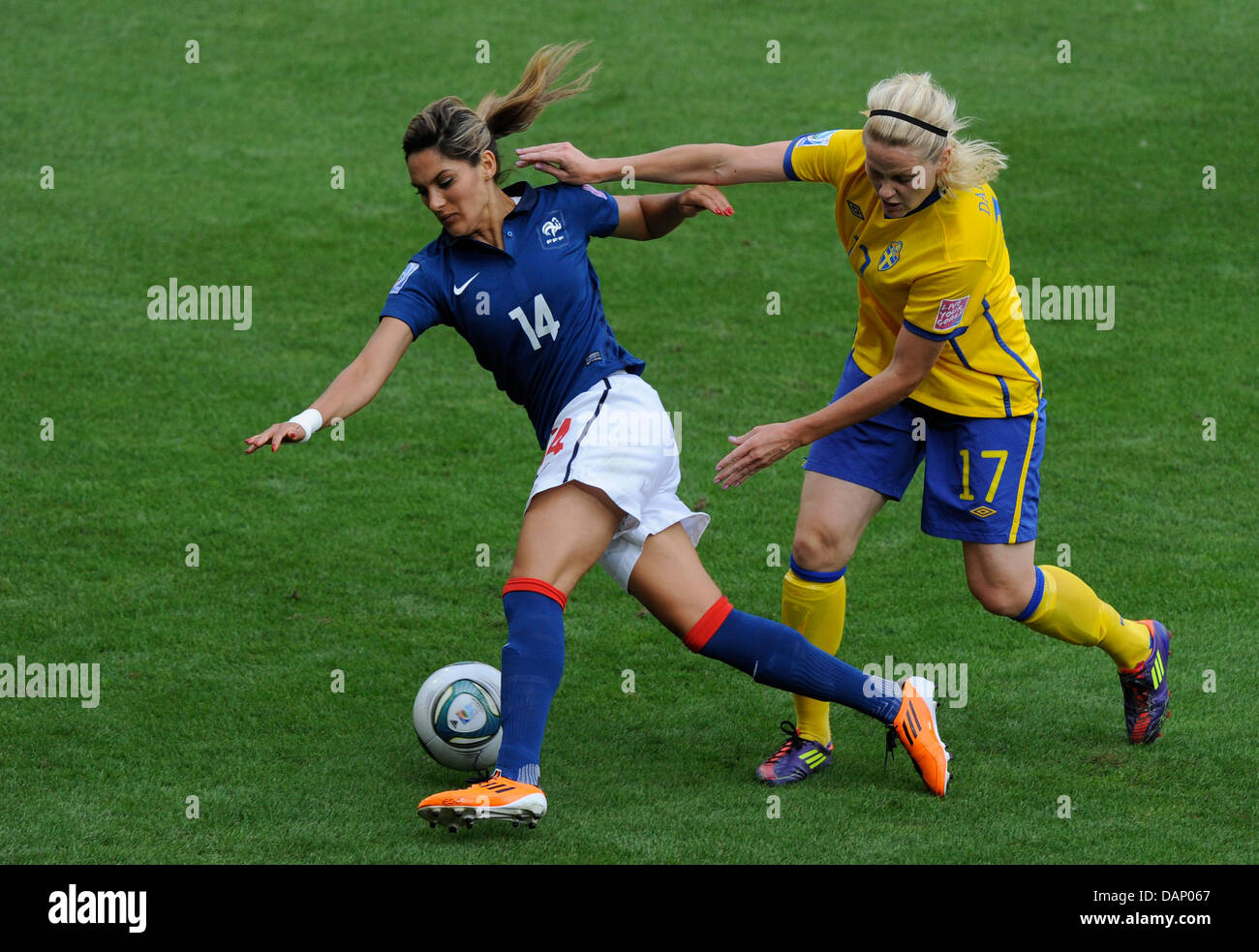 Sweden's Lisa Dahlkvist (R) and France's Louisa Necib vie for the ball ...