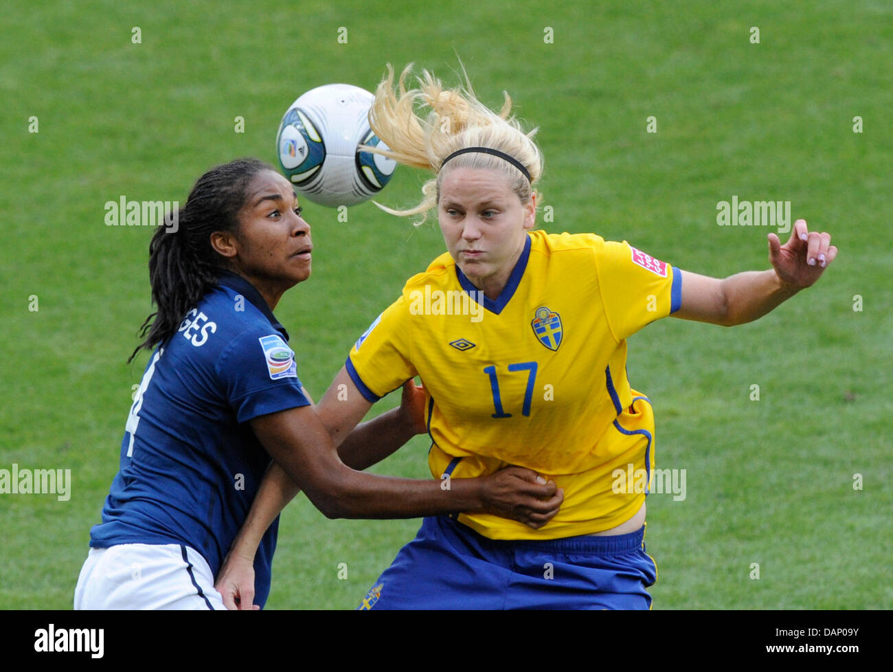 Sweden's Lisa Dahlkvist (R) and France's Laura Georges vie for the ball ...