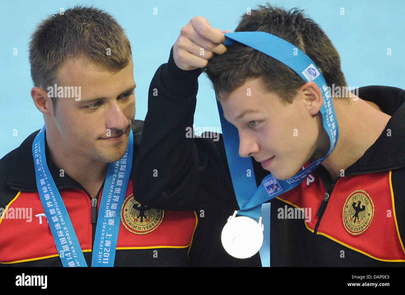 Germany's Sascha Klein (L) and Patrick Hausding display their Silver ...