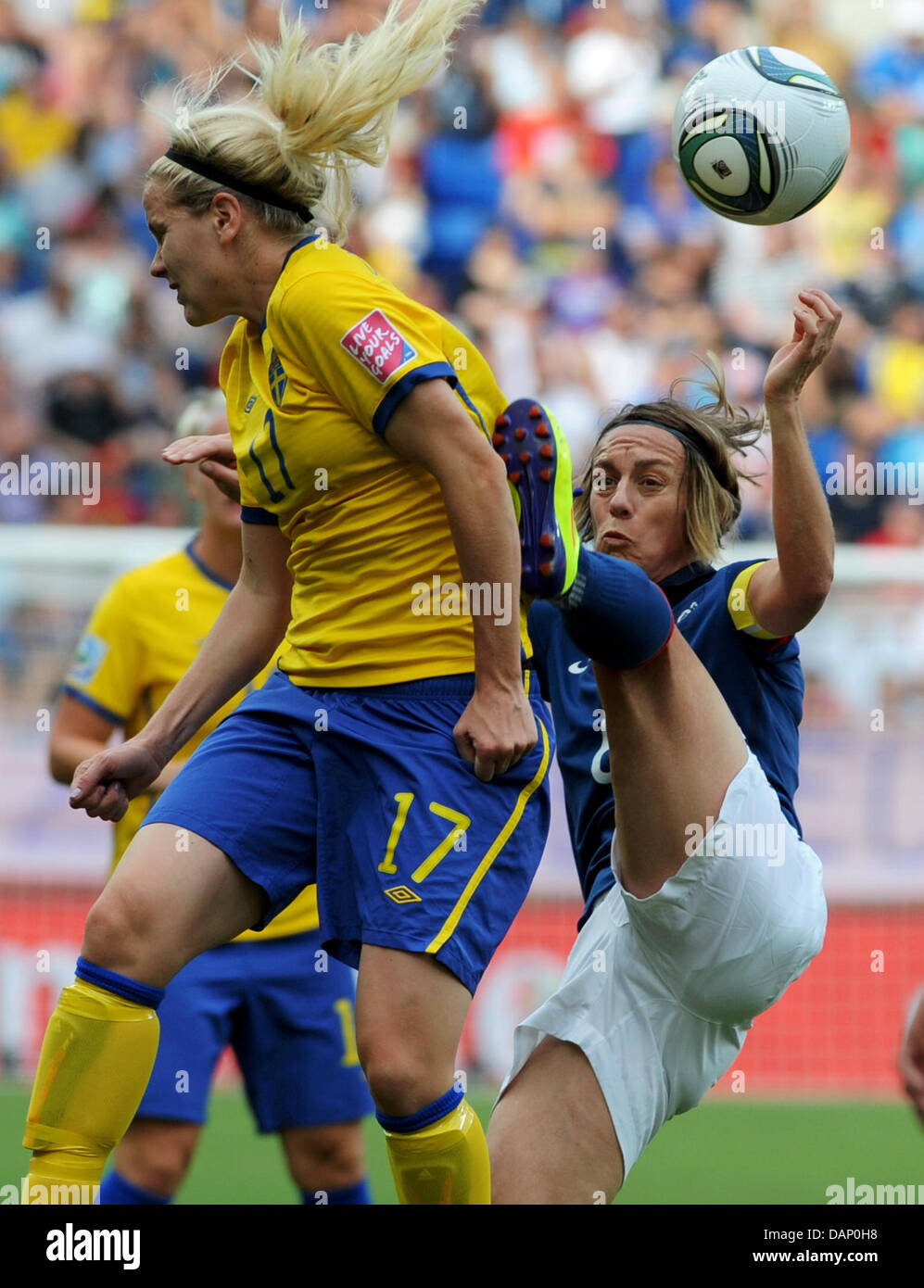 Sweden's Lisa Dahlkvist (l) and France's Sandrine Soubeyrand vie for ...