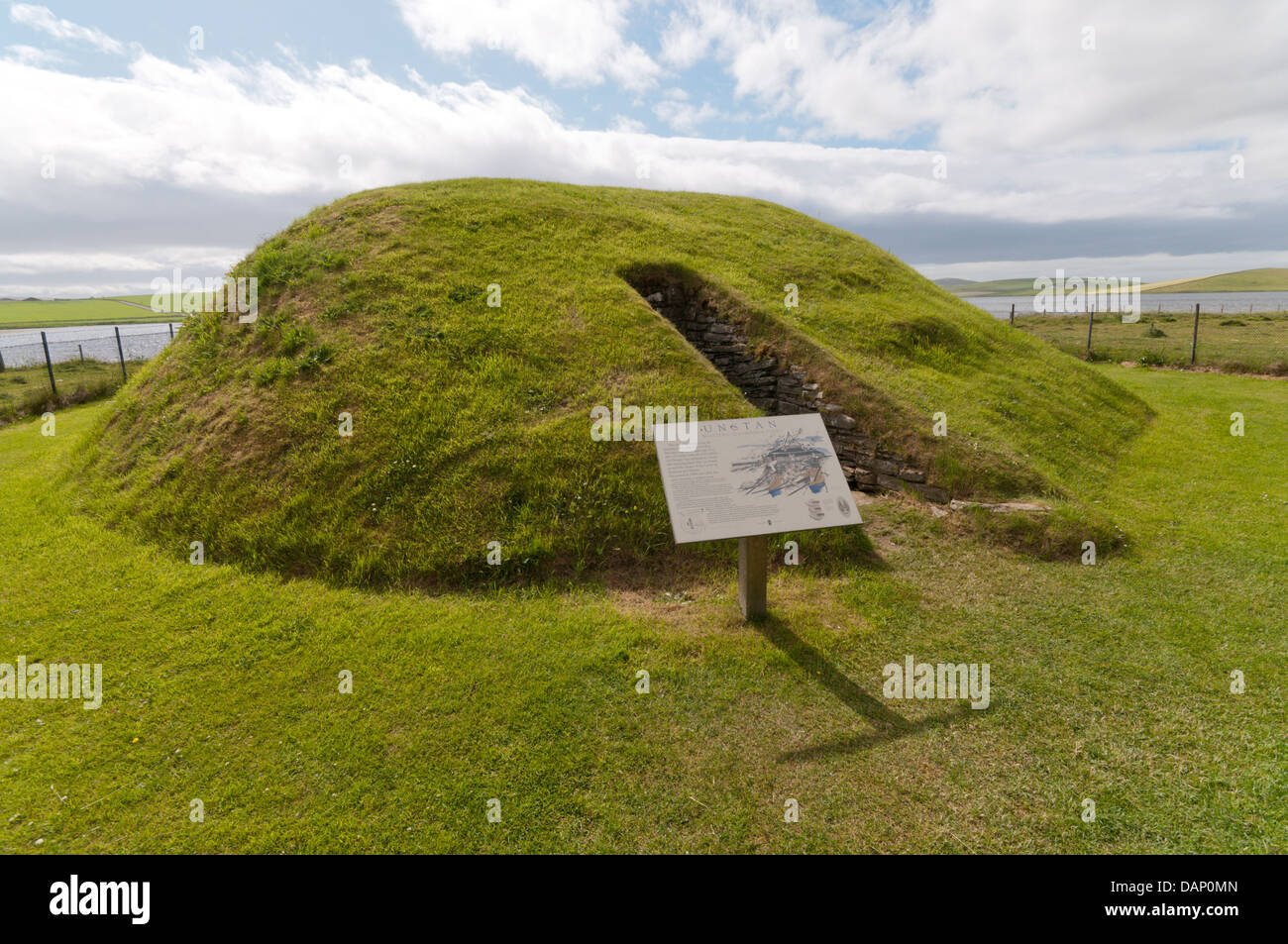 The chambered tomb of Unstan on Orkney Mainland with the Loch of ...