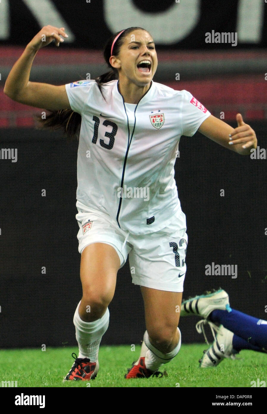 USA's Alex Morgan celebrates after scoring the 0-1 goal during the FIFA ...