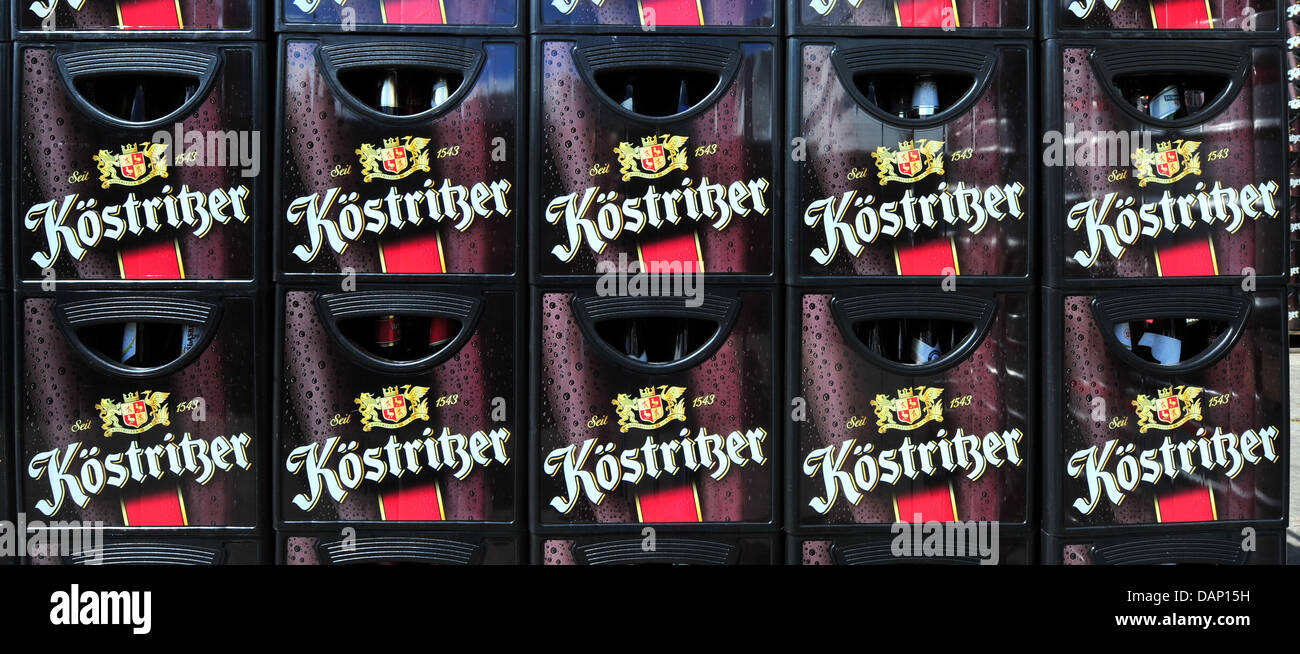 Beer crates stand inside the store of the Koestritz black beer brewery ...