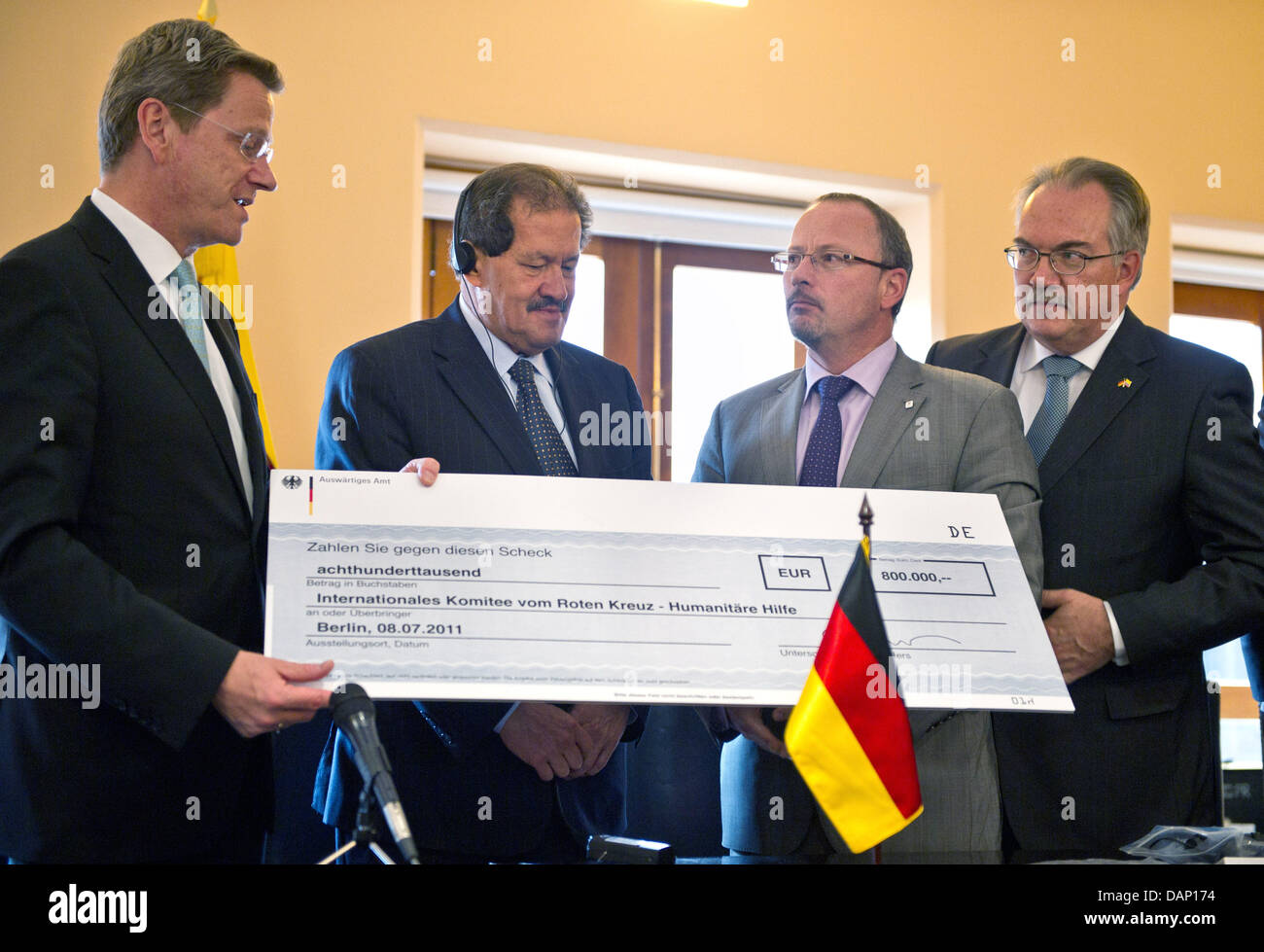 During handing over the symbolic cheque for the support of the Red ...