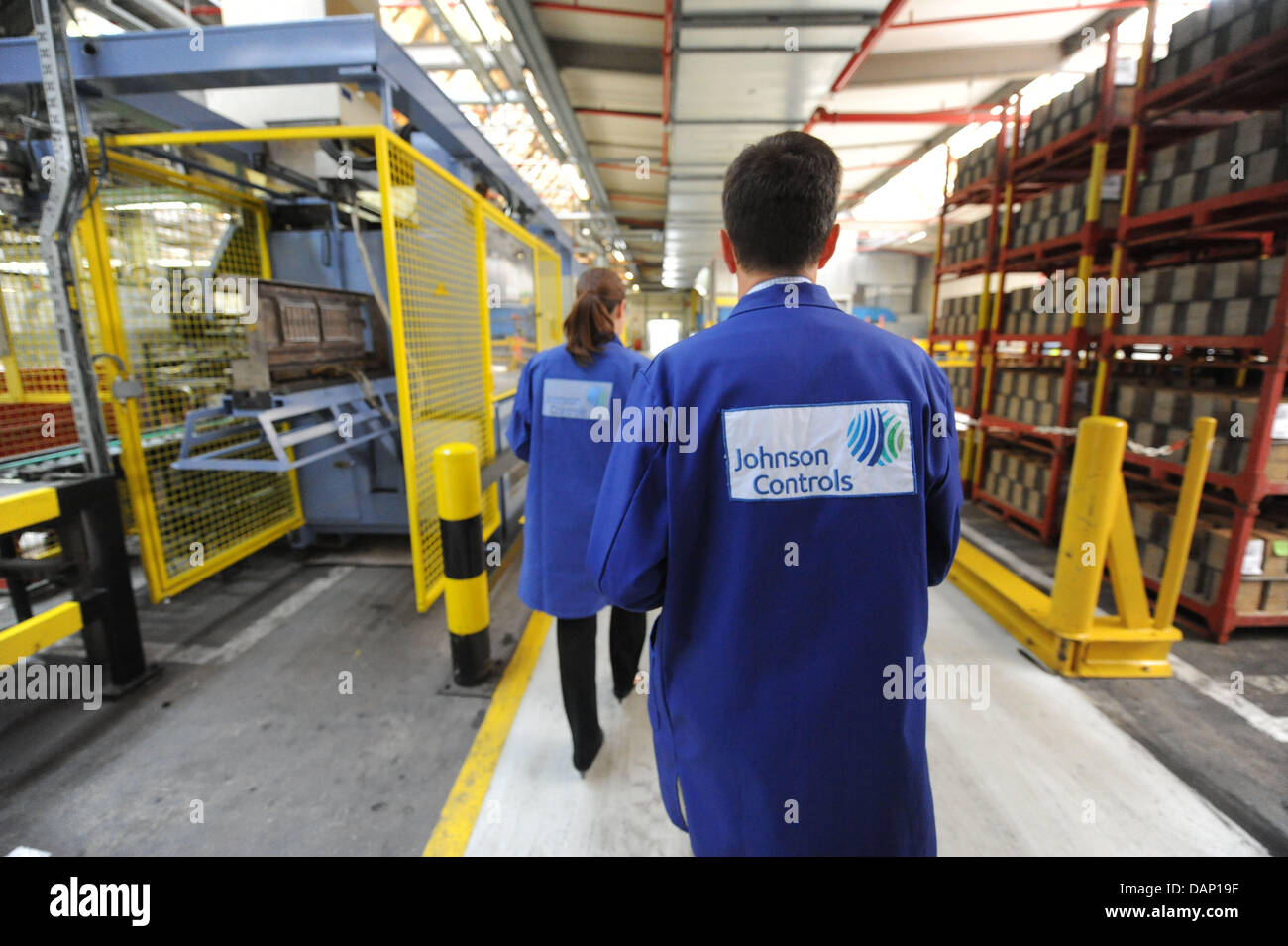 Staff members walk through the productions halls at the Johnson ...