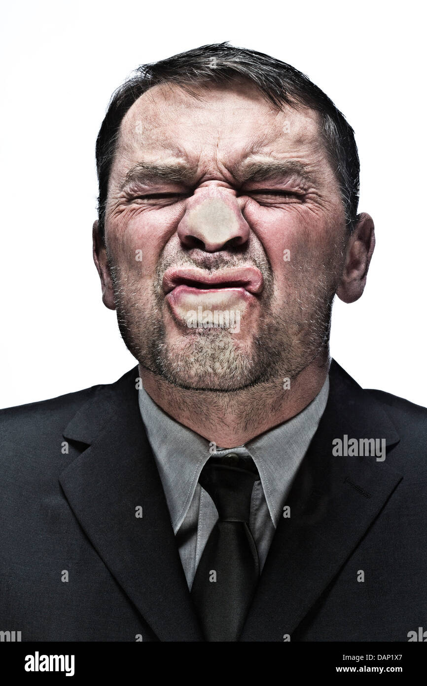 Mature man face against glass window, close up Stock Photo - Alamy