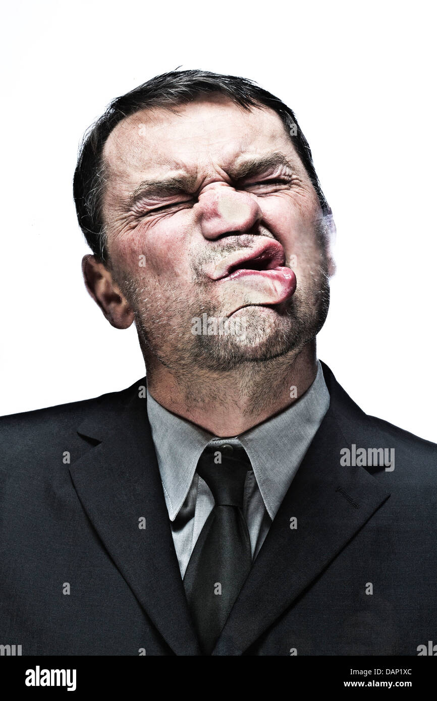Mature man face against glass window, close up Stock Photo - Alamy