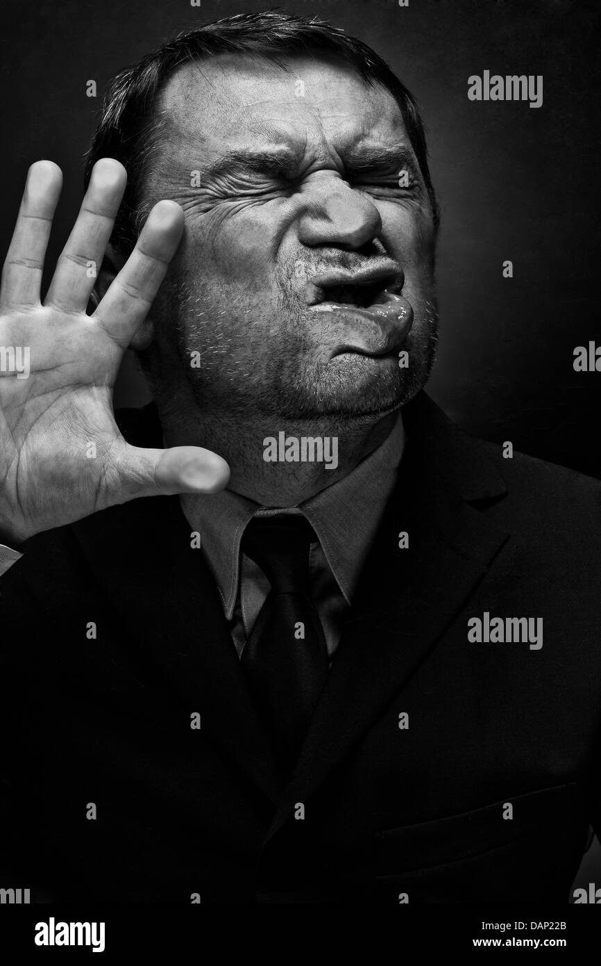 Mature man face against glass window, close up Stock Photo - Alamy