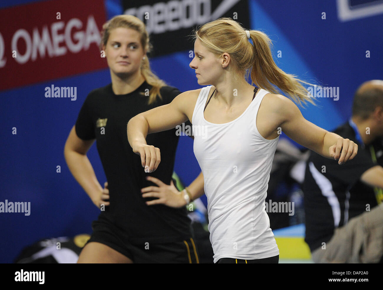 Swimmers Daniela Schreiber and Lisa Vitting (L) of Germany attend a ...