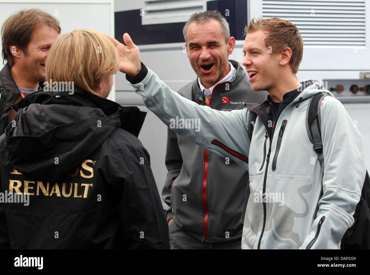 German Formula One driver Sebastian Vettel (R) of Red Bull seen at the ...