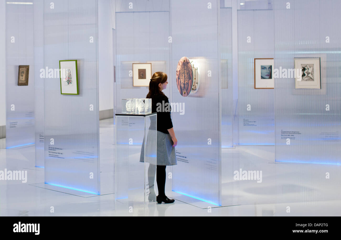 A woman stands in front of the work 'Self-Portrait' of Helen Chadwick ...
