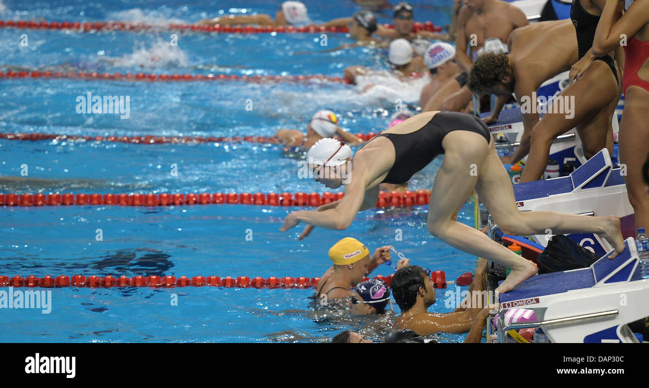 Swimmer Britta Steffen of Germany jumpsfrom the starting block during a ...