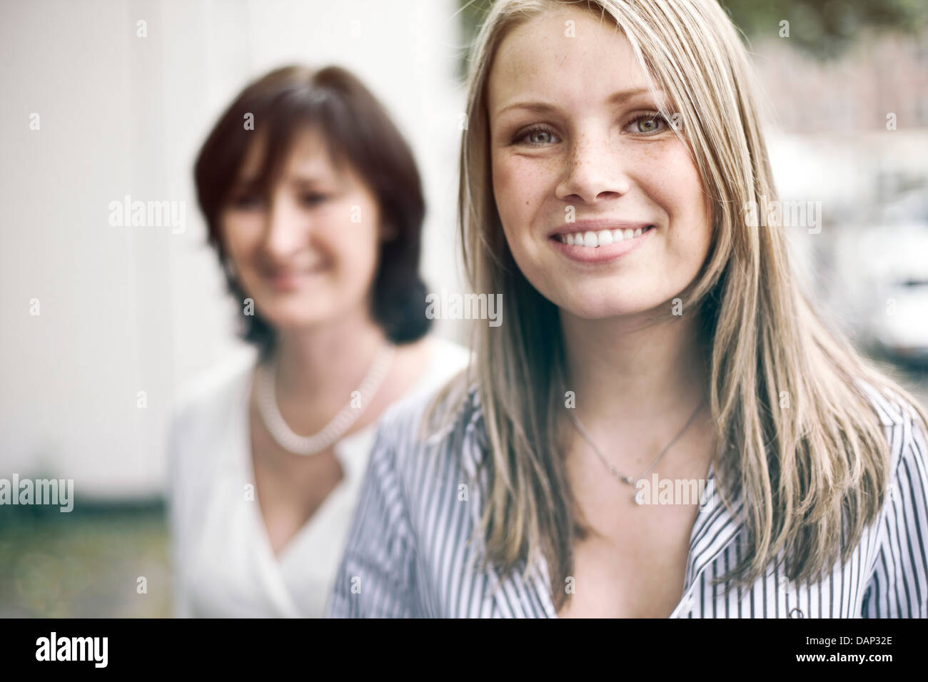 Germany, Duesseldorf, Portrait of women, smiling Stock Photo - Alamy
