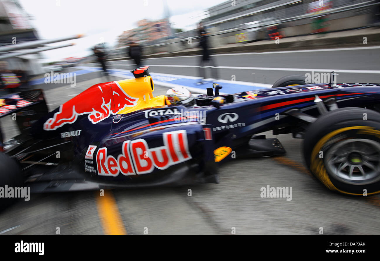 German Formula One driver Sebastian Vettel of Red Bull drives his ...