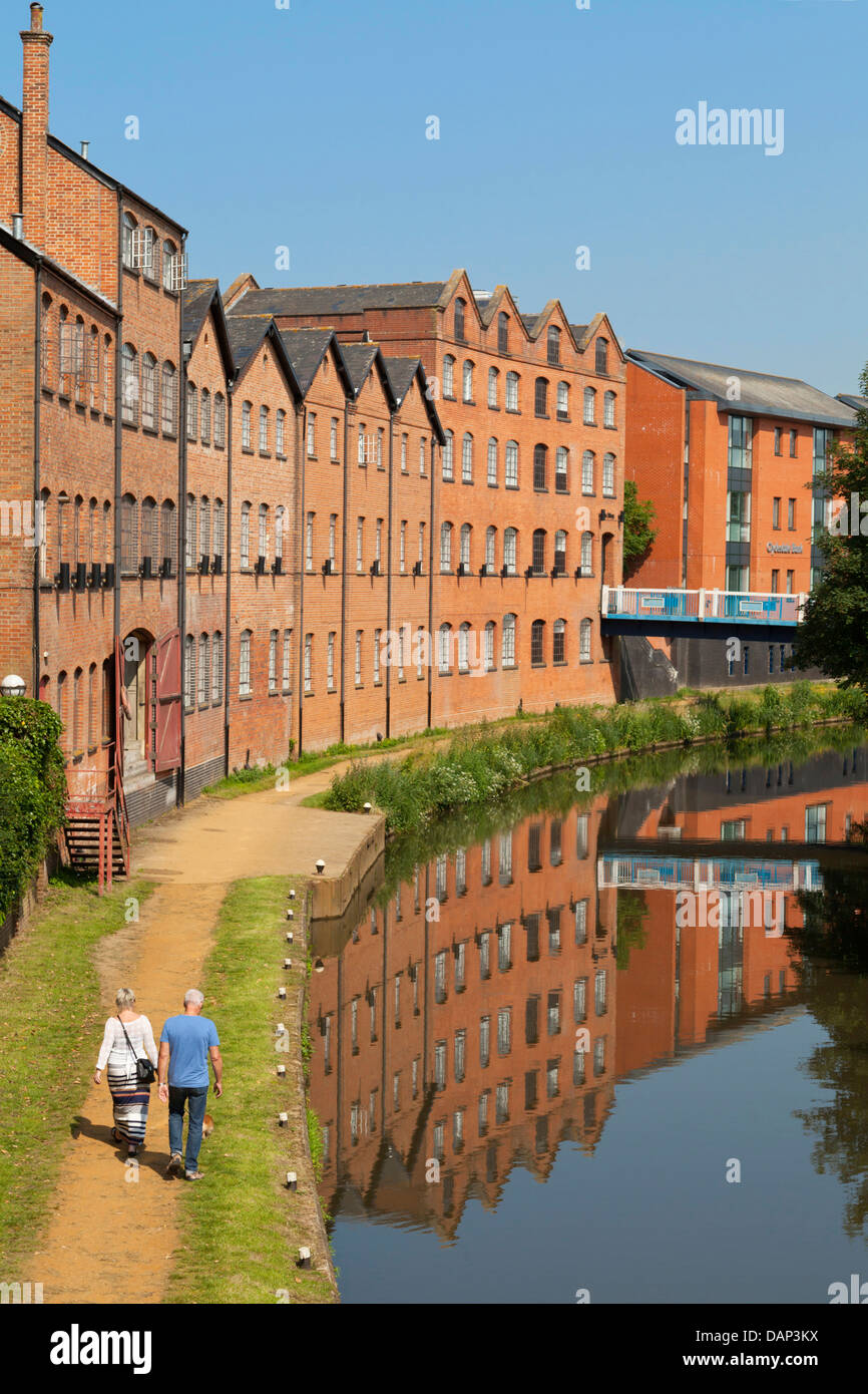 A Couple Stroll the River Side in Guildford Stock Photo - Alamy