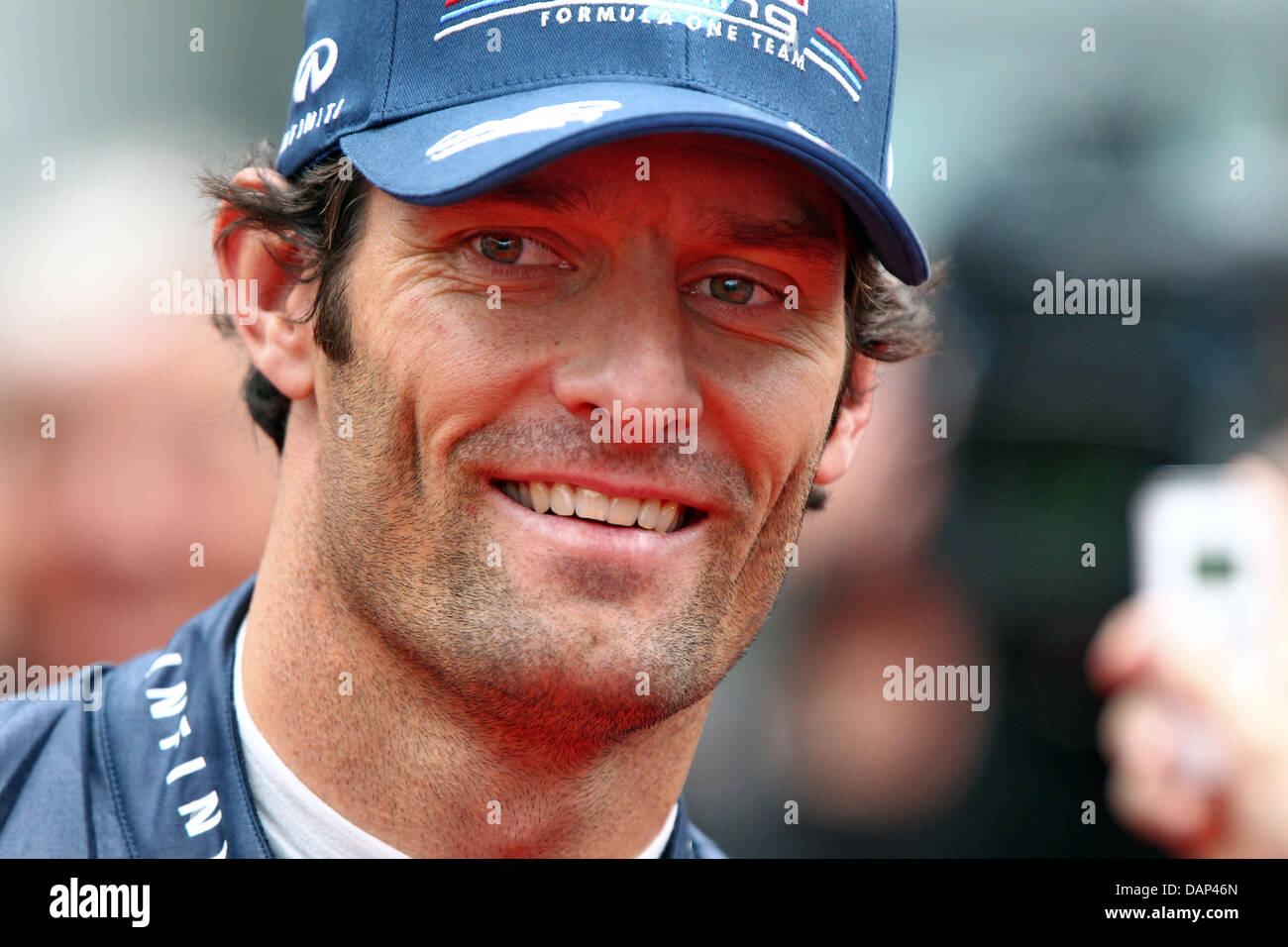 Australian Formula One driver Mark Webber of Red Bull smiles after the ...