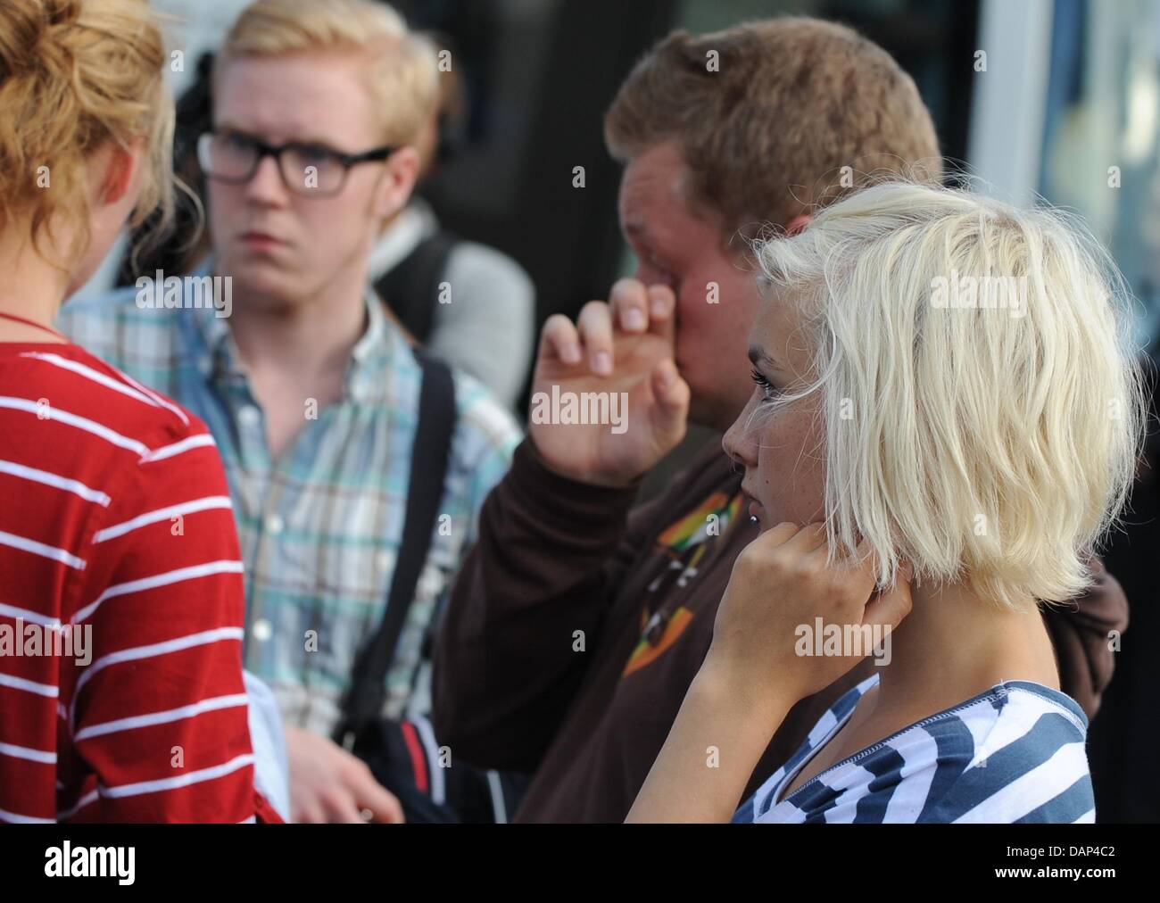 Survivors of the massacre on Utoya island react in Sundvollen, Norway ...