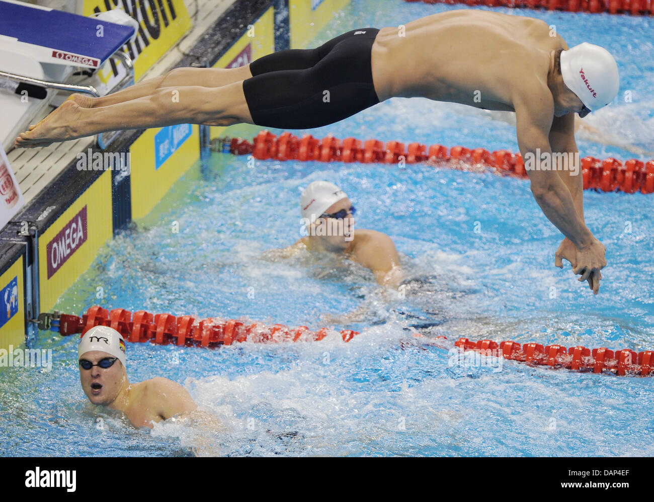 Swimmers Steffen (L) and Markus Deibler (Top) of Germany attend the men ...