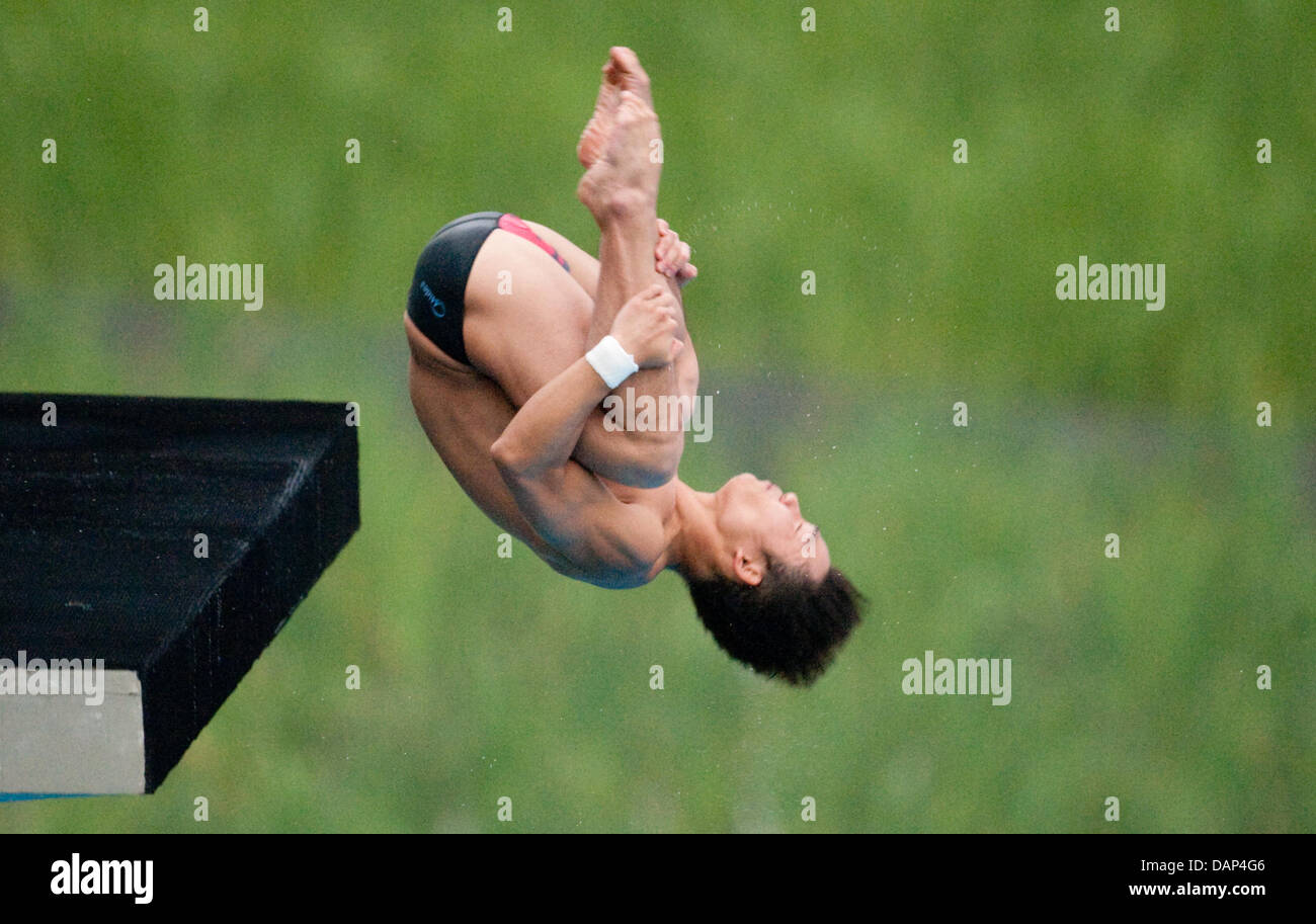Bo Qiu of China in action during the 10m platform final at the 2011 ...