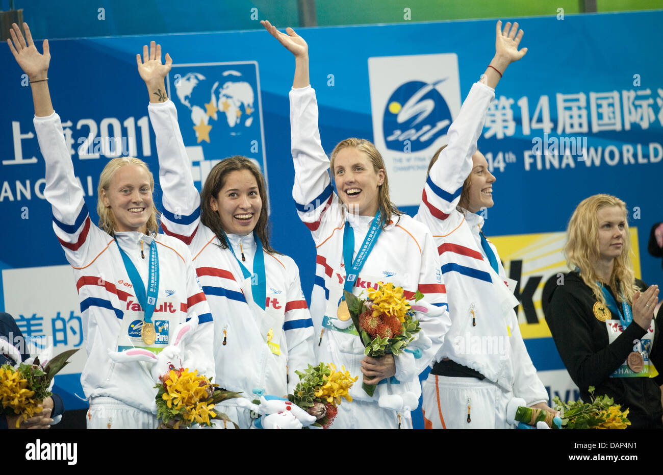 The gold medal winning Dutch 4x100m Women's swimming team at the medal ...