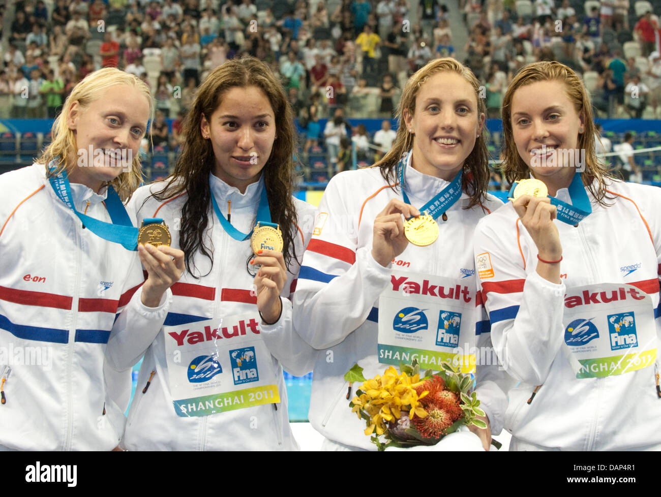 The gold medal winning Dutch 4x100m Women's swimming team after the ...