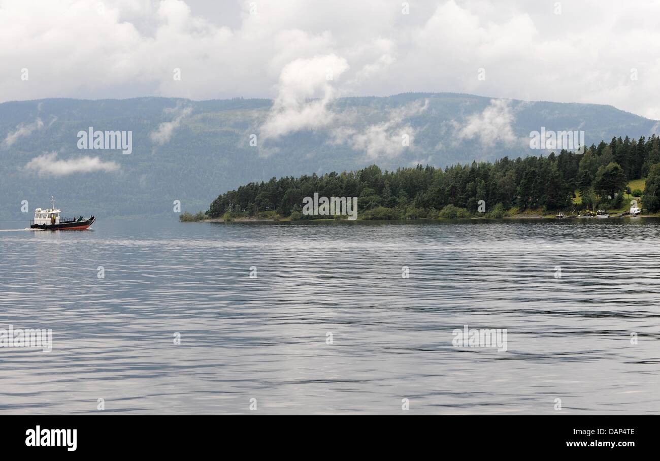 A ferry makes its way to Utoya island, Norway, 24 July 2011. The ...