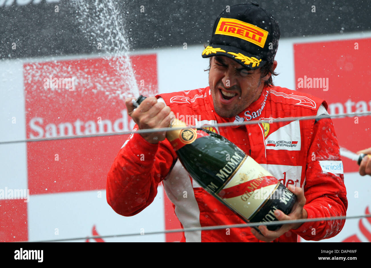 Second placed Spanish Formula One driver Fernando Alonso of Ferrari ...