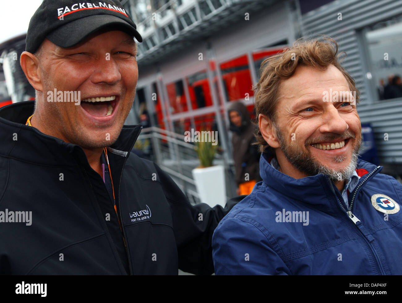 German boxer Axel Schulz next to actor Richy Müller at the grid prior ...