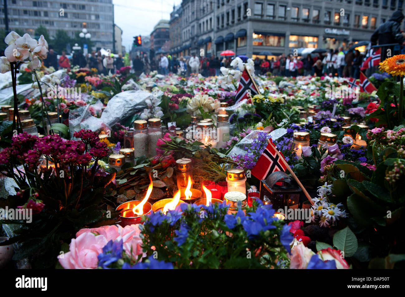 Norwegian flags, flowers and candles commemorating the victims of the ...