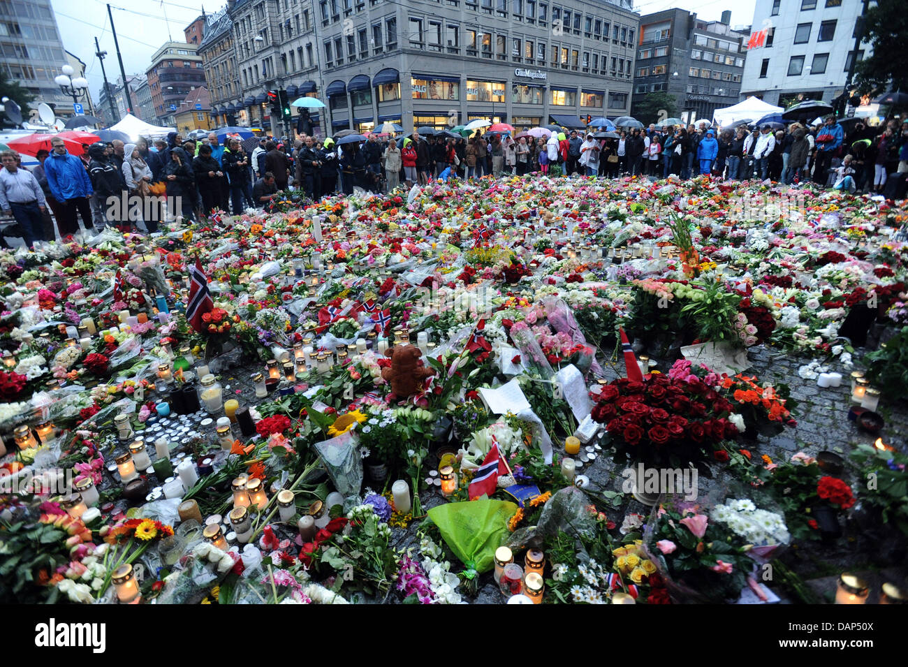 Norwegian flags, flowers and candles commemorating the victims of the ...
